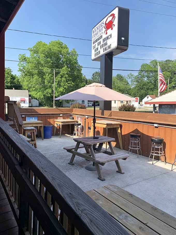 The outdoor seating area: where summer breezes complement seafood feasts and conversations flow as freely as the sweet tea.