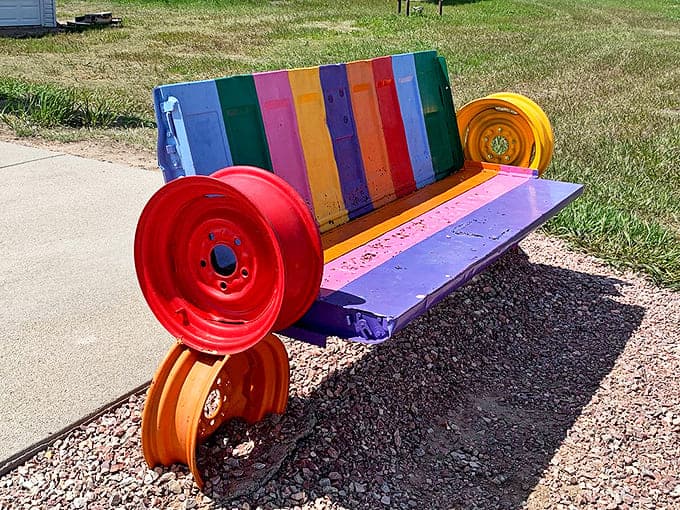Even the seating at Carhenge stays on theme &ndash; this colorful bench with wheel armrests ensures your rest is as automotive-inspired as the main attraction.