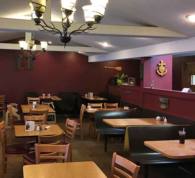 Cozy booths and warm lighting create the perfect backdrop for conversations that linger long after the plates are cleared.