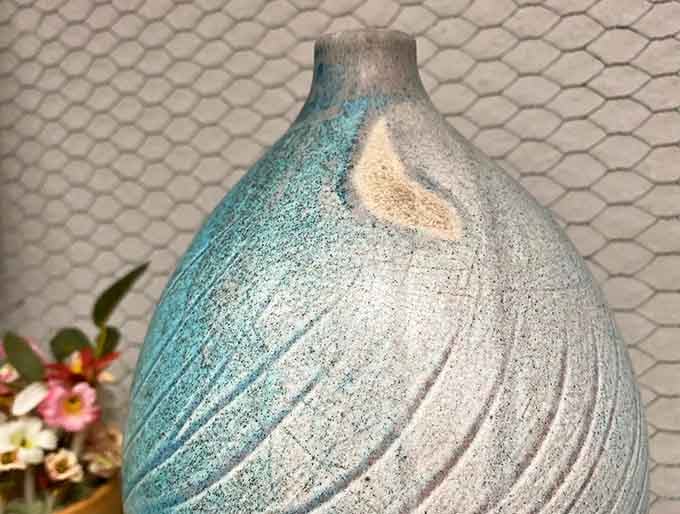 This isn't just a vase &ndash; it's functional art with ocean-inspired hues. The perfect vessel for wildflowers or simply standing alone as a statement piece.