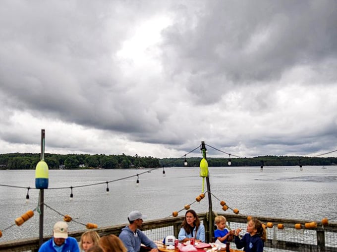 The view that seasons every bite. Dramatic skies over the Sheepscot River remind you why seafood always tastes better when eaten within sight of its source.