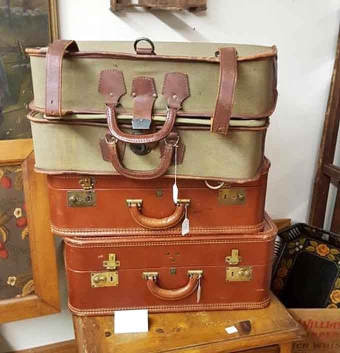 Vintage leather suitcases stacked like they're ready for a glamorous journey on the Orient Express.