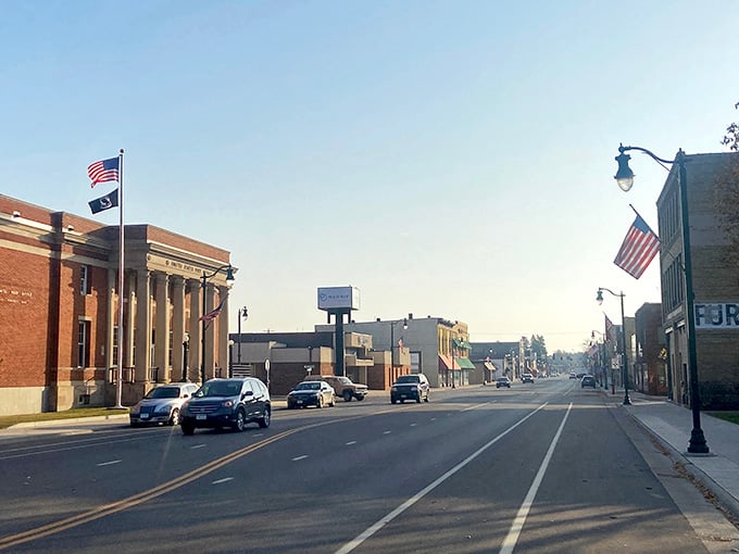 Morning light catches the flags and facades perfectly, making this quiet street scene look absolutely magazine-worthy today.