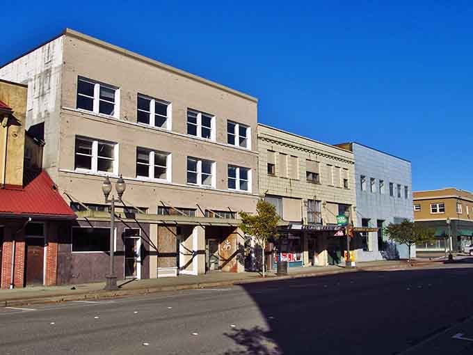 Aberdeen's historic downtown stands proud under blue skies, where brick buildings whisper tales of timber boom glory days.