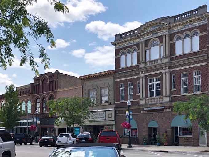These grand Victorian storefronts stand like proud sentinels of a bygone era, their ornate brickwork whispering tales of prosperity.