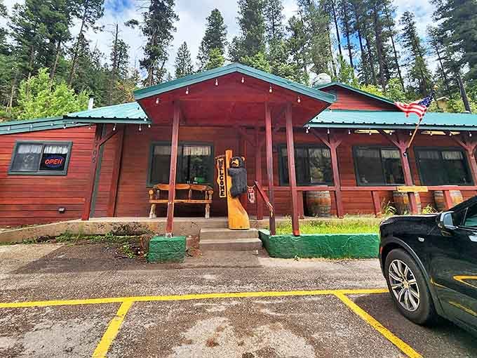 Big Daddy's rustic cabin exterior welcomes hungry hikers and locals alike. That porch practically begs you to sit a spell!
