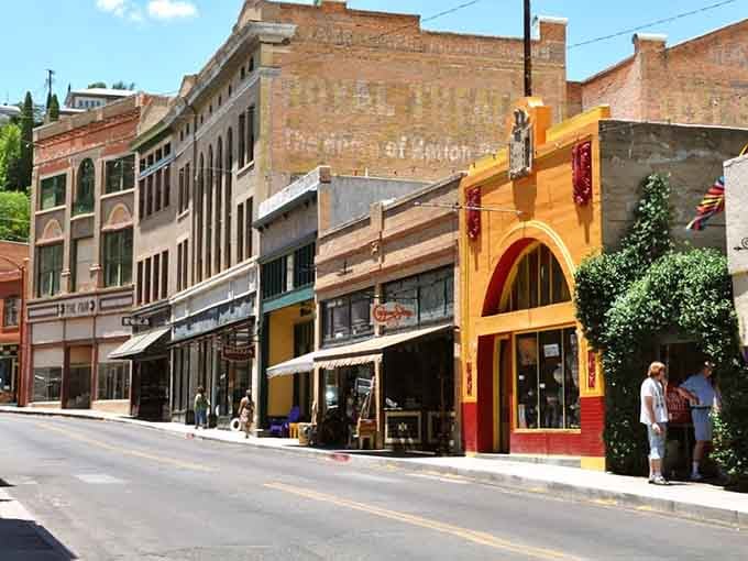 Historic brick buildings line these sun-drenched streets where mining history meets modern charm in perfect harmony.