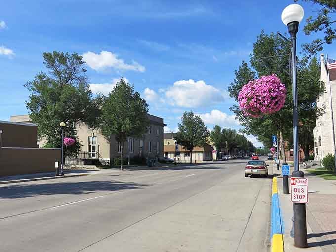 Crookston's Main Street welcomes you with hanging flower baskets that could make a botanical garden jealous. Small-town charm at its finest!