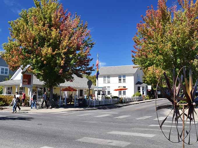 Autumn paints Eastsound's main square in brilliant colors while locals gather beneath trees that remember generations past.