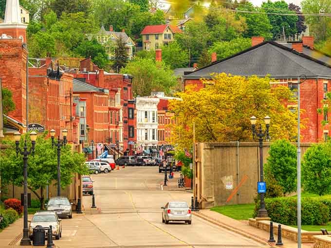 Look at those brick buildings cascading down the hillside like a Victorian waterfall frozen in time and charm.
