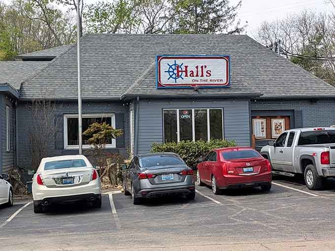 That full parking lot tells you everything you need to know about what's waiting inside this unassuming gray building.