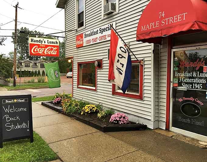 The vintage Coca-Cola sign and "OPEN" flag have been welcoming hungry Burlingtonians for generations. Small building, big flavors!