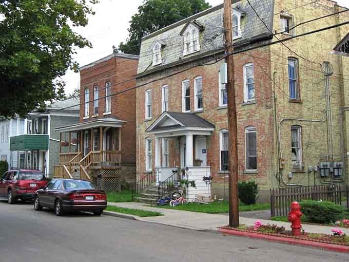 Classic brick townhouses line these affordable streets where neighbors still know each other's names and wave hello.