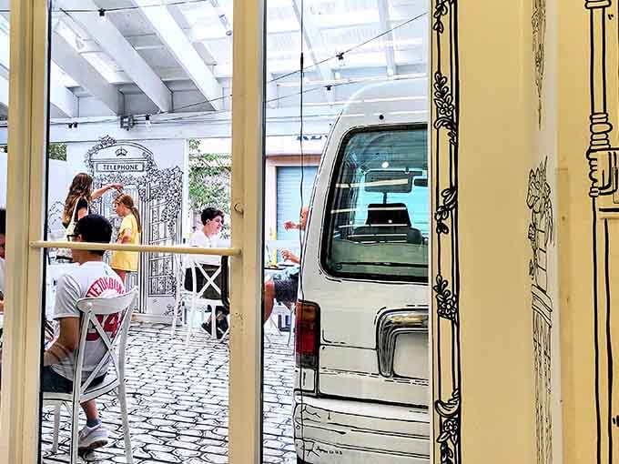 Dining inside a comic book sounds impossible until you step into this black-and-white illustrated wonderland.