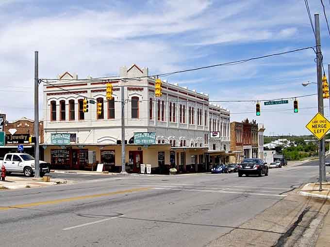 These historic storefronts stand like proud sentinels of a slower era, where window shopping was the entertainment.