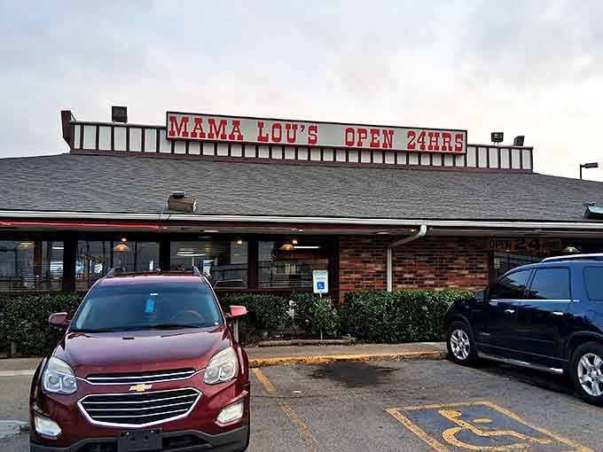 Mama Lou's iconic red sign beckons hungry travelers 24/7 &ndash; a brick-and-mortar lighthouse for comfort food seekers.