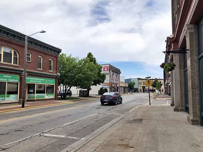 Classic brick storefronts line quiet streets where parking is plentiful and stress is optional.