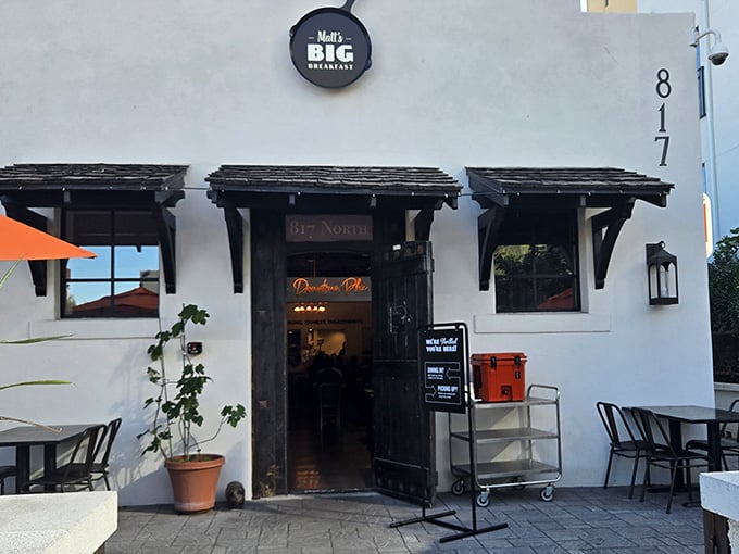 Matt's Big Breakfast exterior welcomes hungry patrons with rustic wooden awnings and a promise of morning delights.