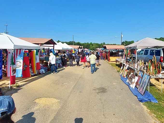 Rows of colorful tents stretch endlessly under blue skies, promising treasures around every corner you explore.