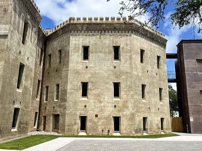 This fortress-like stone tower looks like something from a medieval castle, complete with battlements and serious vibes.