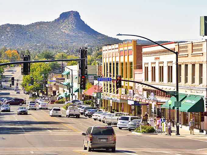 Historic Prescott's downtown stretches beneath Thumb Butte, where charming storefronts welcome visitors like old friends waiting for a catch-up chat.