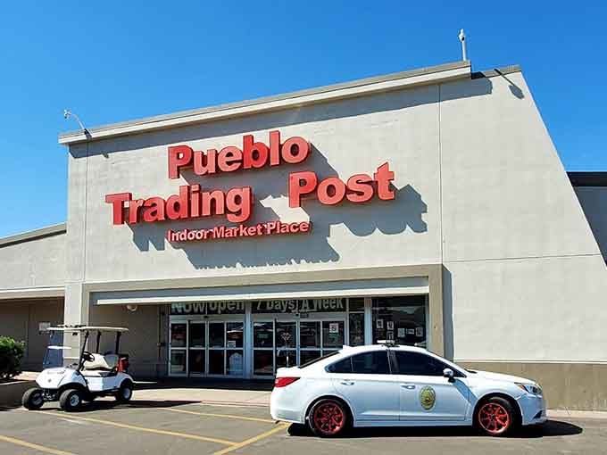 That bold red signage against the blue Colorado sky practically shouts "treasures inside" to anyone driving by.