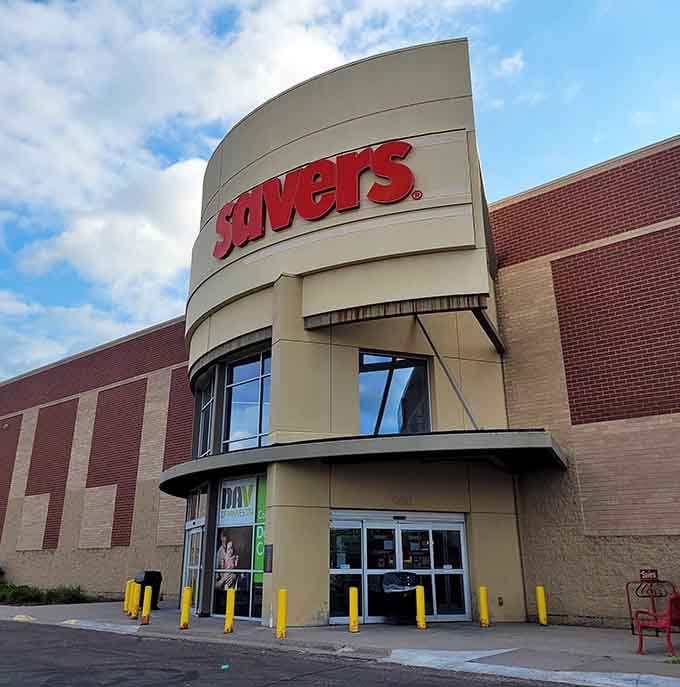 The iconic red Savers sign beckons like a lighthouse to thrift enthusiasts. This Woodbury location promises treasures behind those automatic doors.