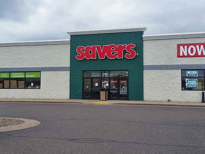 The iconic green and red Savers storefront beckons like a treasure chest waiting to be opened. Thrift nirvana awaits!