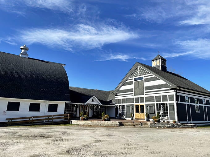 That gorgeous barn architecture under blue skies promises treasures inside that'll make your heart sing with joy.