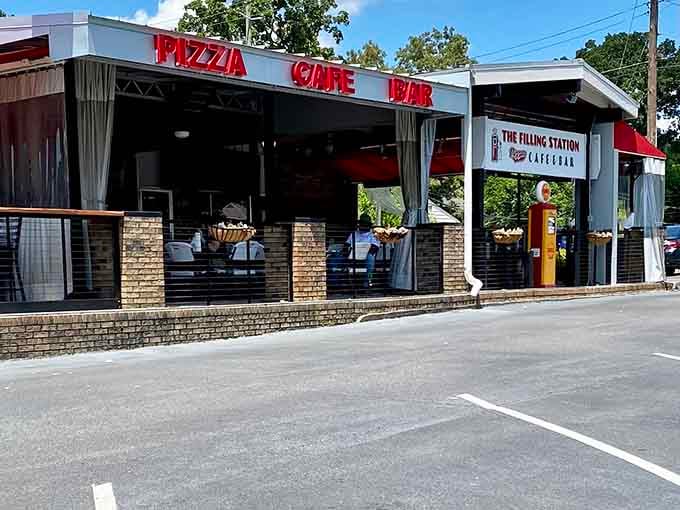 The Filling Station's neon sign glows like a beacon for pizza lovers. Who knew an old gas station could fuel such delicious cravings?