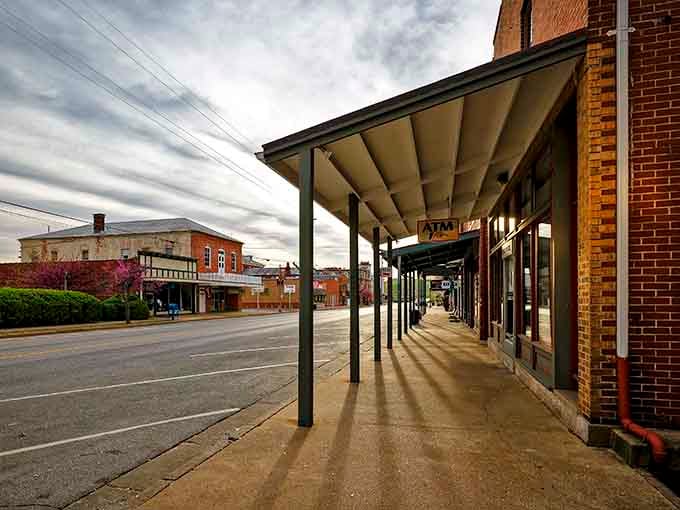Those covered sidewalks aren't just charming, they're proof Hermann planned for comfort long before air conditioning existed.