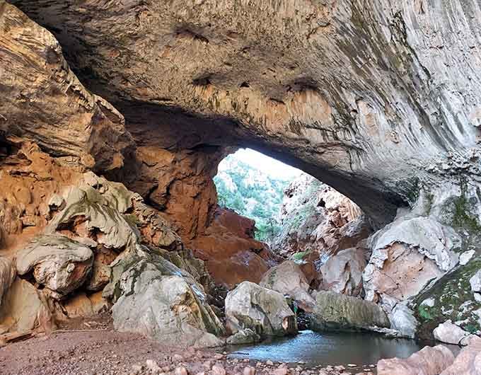 Standing beneath this natural stone cathedral, you'll feel smaller than a coffee bean but twice as energized.