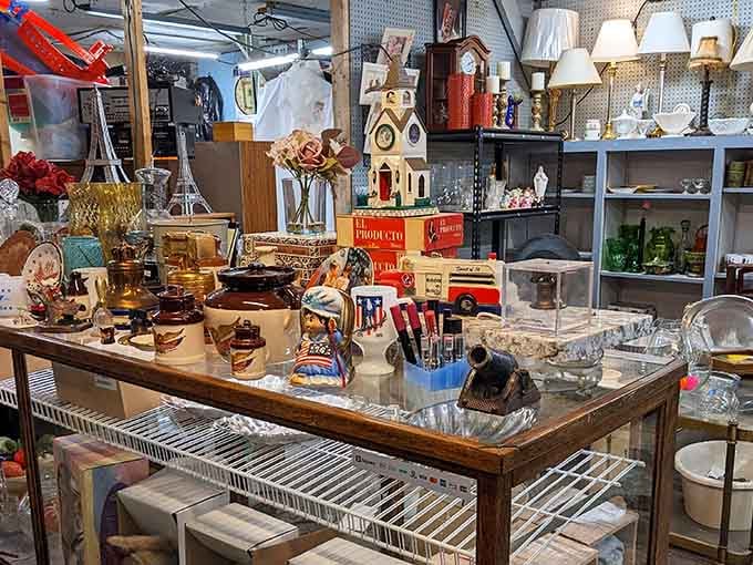 Vintage glassware and collectibles create a nostalgic wonderland where every shelf tells a different story from decades past.