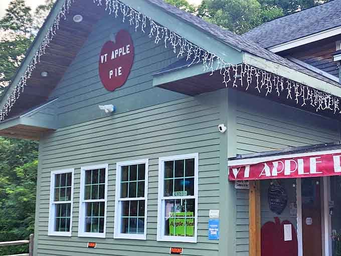 The green facade of Vermont Apple Pie Bakery with its cheerful red apple sign promises sweet treasures within. Like finding the emerald castle at the end of a hungry yellow brick road!