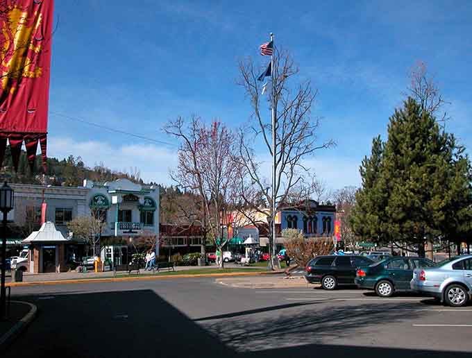 Downtown Ashland welcomes visitors with its charming storefronts and American flag, like a small-town postcard come gloriously to life.