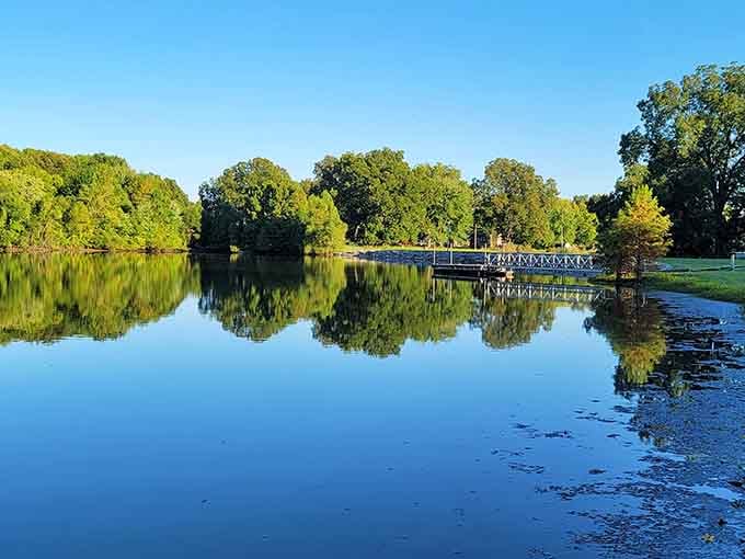 That dock stretching into glass-smooth water practically begs you to sit and watch the world slow down.