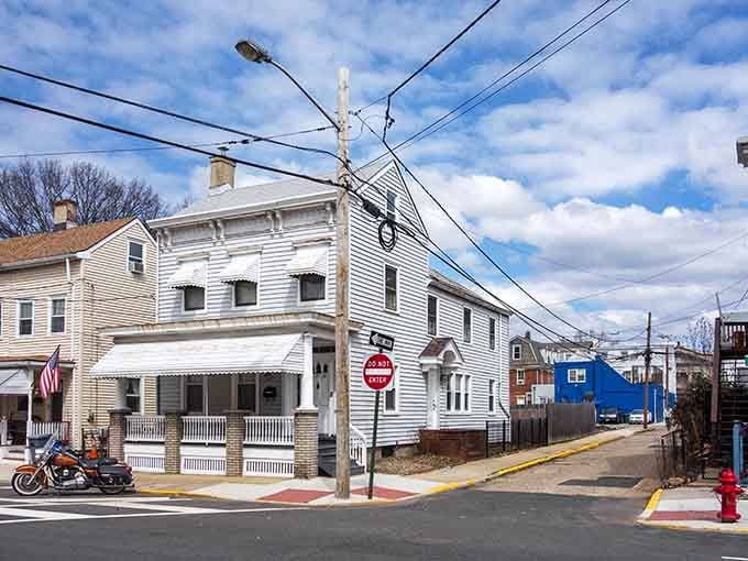 Classic white clapboard architecture meets small-town charm where porches were made for watching the world slow down.
