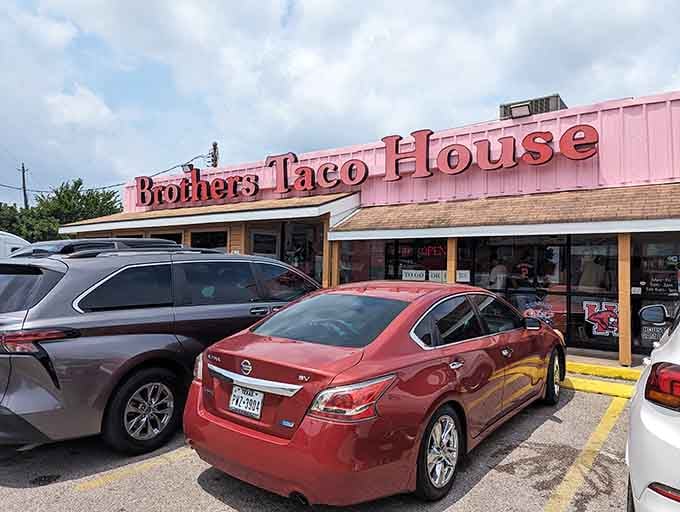 A pink-roofed taco paradise where locals line up for handmade tortillas that could make a grown Texan weep with joy.