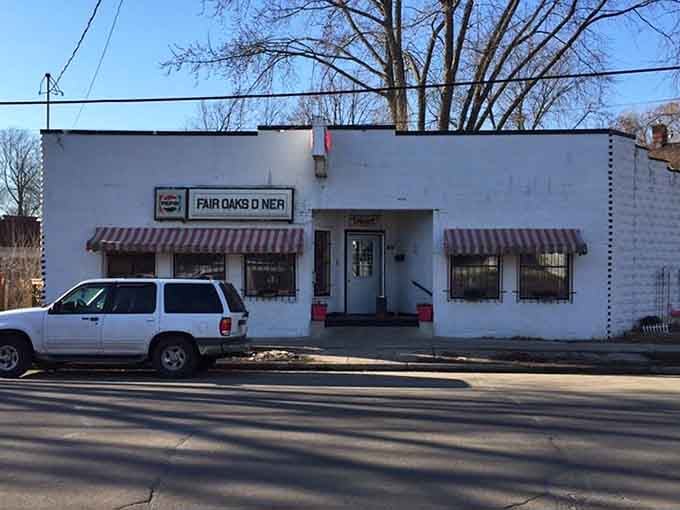 The simple white exterior hides a breakfast paradise where locals gather for perfectly cooked eggs and endless coffee.