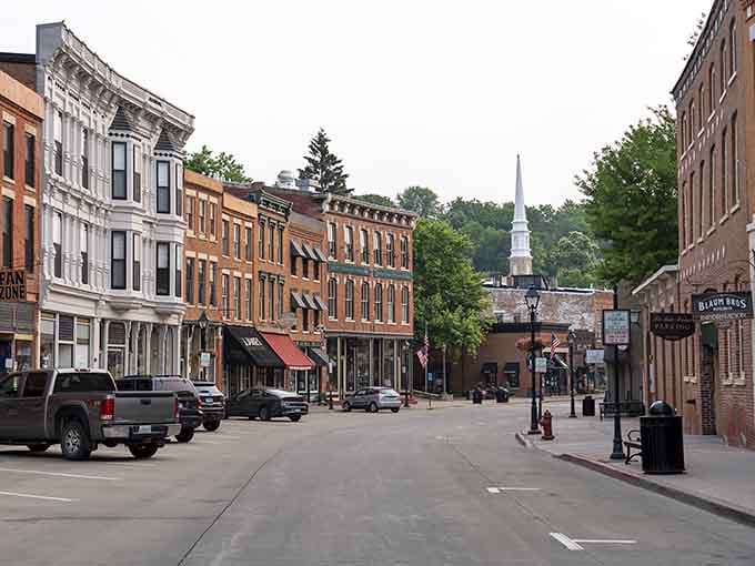 That white church steeple peeking through the trees is calling you to explore streets where history lives in every storefront.