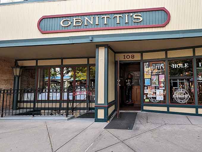 The welcoming entrance and vintage signage prove that dinner theater doesn't need glitz when you've got genuine charm.
