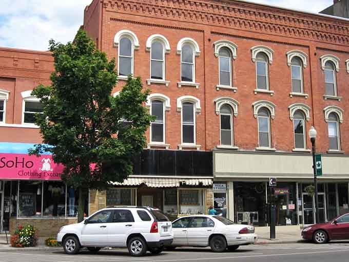 Downtown storefronts with arched windows tell stories of a working town where your dollar still means something.