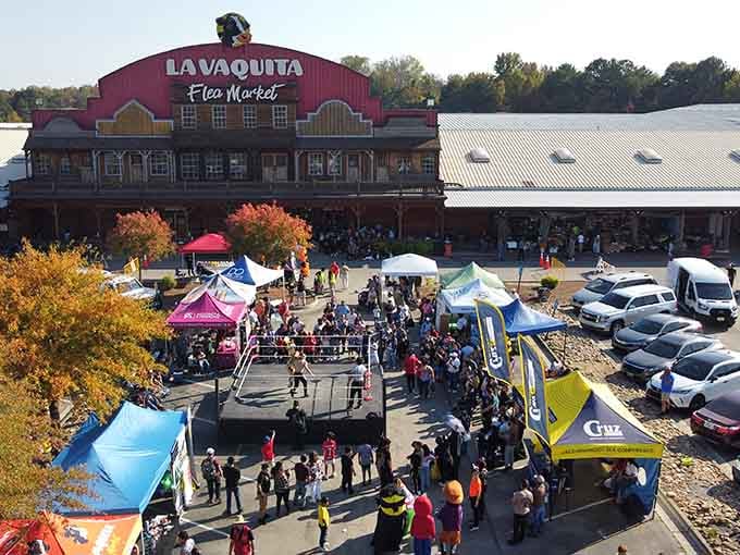 From above, the festival atmosphere comes alive with colorful tents and crowds hunting for weekend bargains.