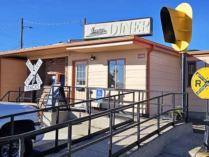That iconic "DINER" sign has been guiding hungry travelers to comfort food heaven since before Instagram made everything "aesthetic." Pure roadside Americana.