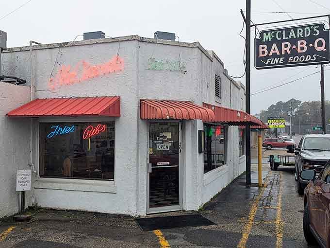 Simple white walls and red awnings hide barbecue greatness within. Like finding out your quiet neighbor used to be in a rock band, McClard's modest exterior belies its flavor superstardom.