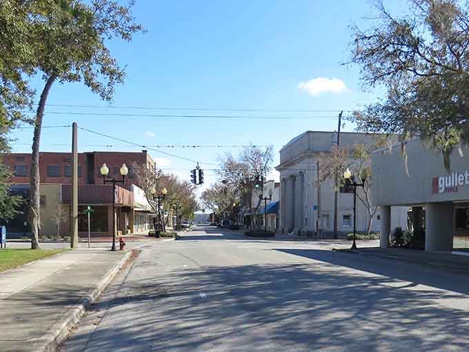 Wide streets stretch toward the horizon, lined with buildings that remember when Florida moved at a gentler pace.