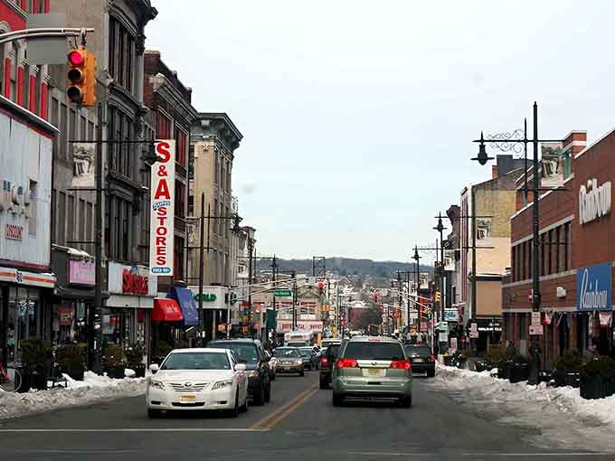 Main Street magic captured in winter light, where vintage storefronts and local shops create that timeless small-town feeling.