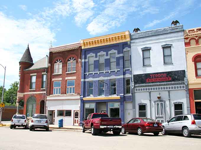 Each building tells its own colorful story, standing shoulder-to-shoulder like old friends who've weathered every storm together.