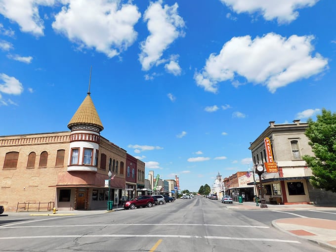 Under those puffy clouds, historic architecture meets small-town charm where everyone still waves to strangers passing through.
