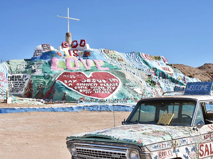 Biblical messages bloom in brilliant hues where the desert meets divine inspiration and artistic passion.